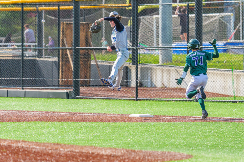 EWHS_s-Adrew-Bau71-gets-to-first-base-and-has-room-to-run-for-more-when ...