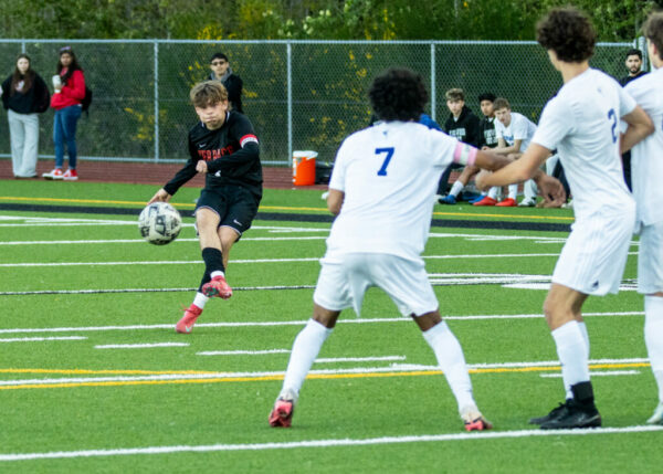 Nicholas Barushka preforms a free kick against Shorewood opponents ...